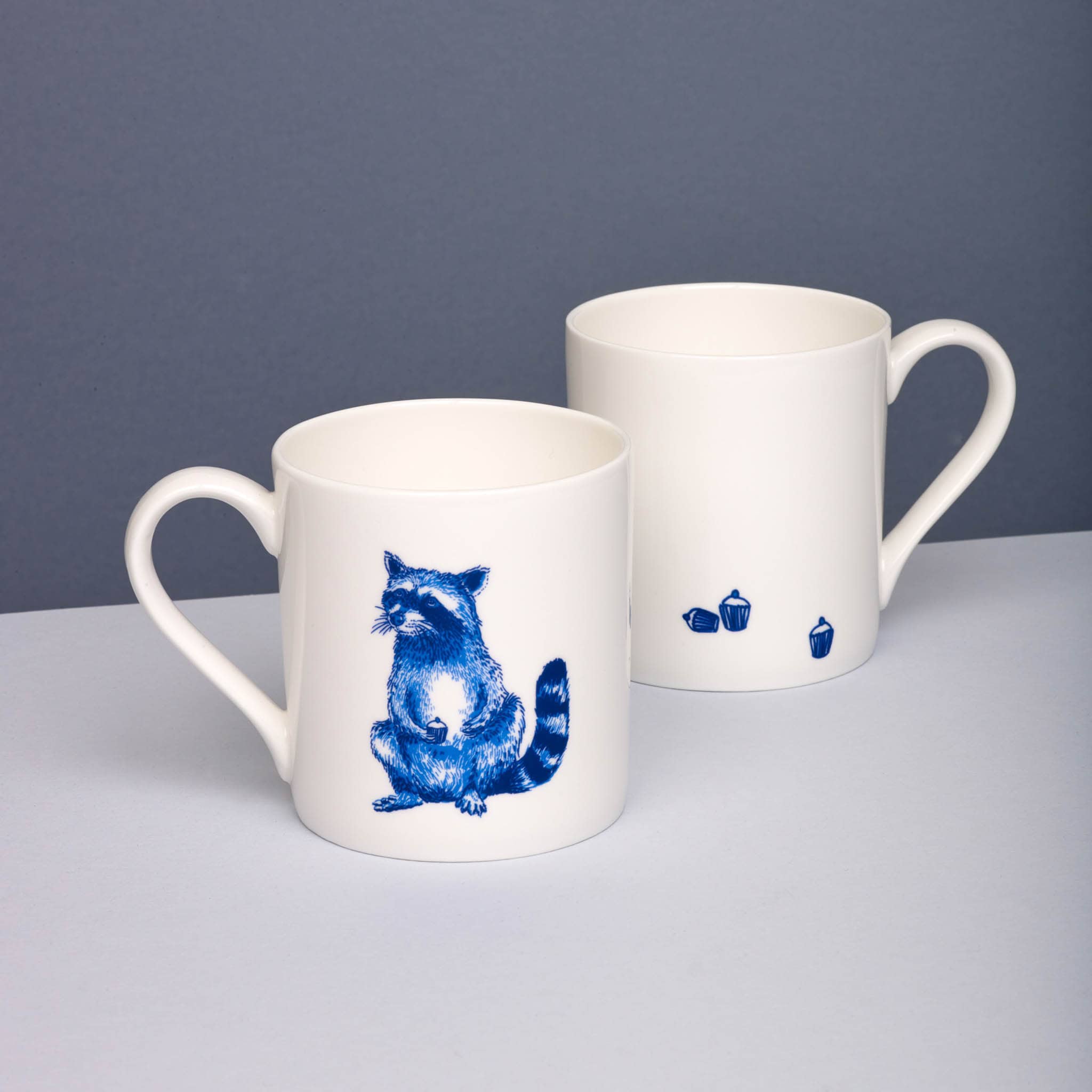Blue Raccoon with Cupcakes Mug 300ml | Buy online UK – Sous Chef UK